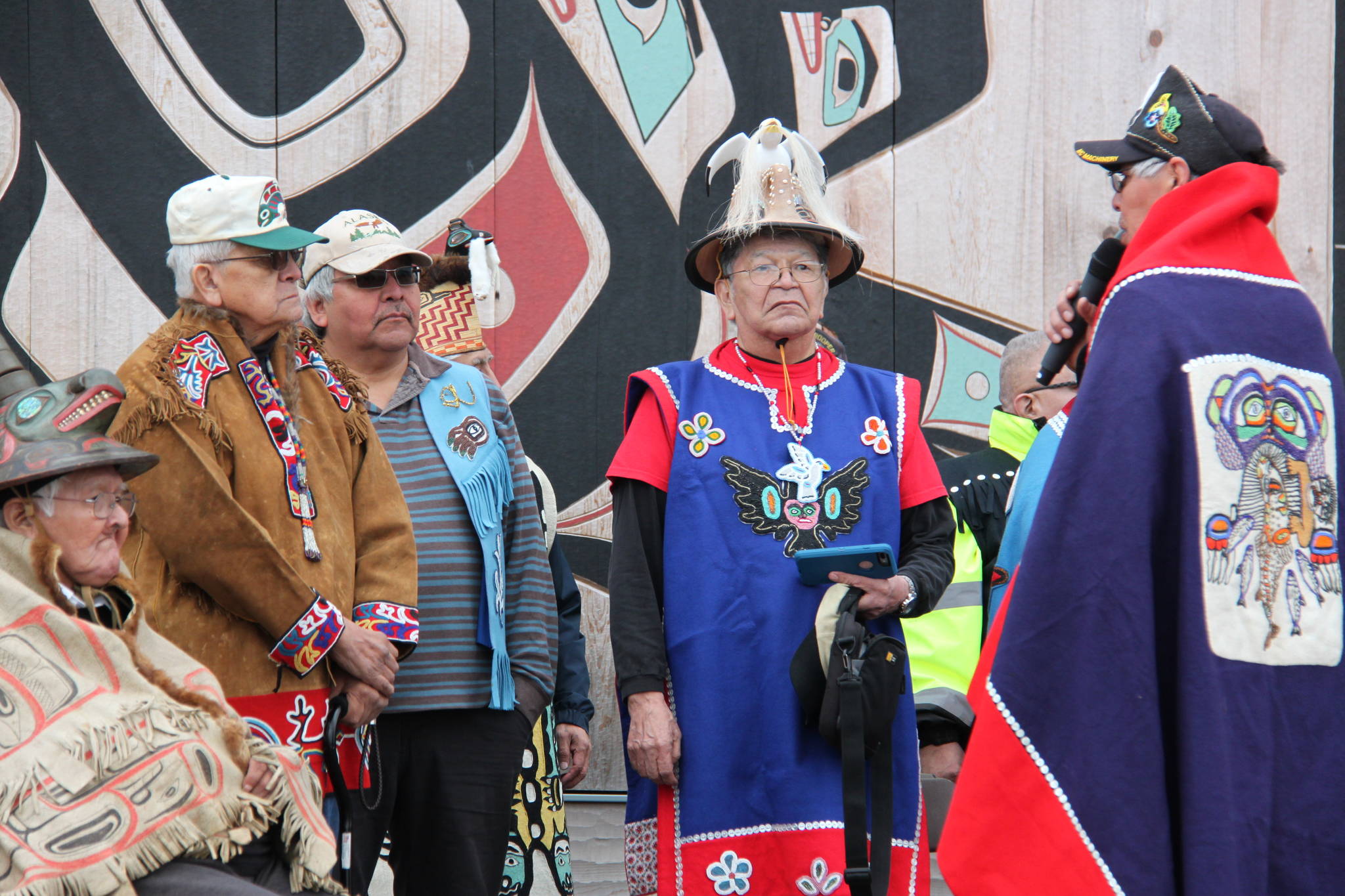 Two totem poles raised in front of Huna Ancestors’ House | Juneau Empire