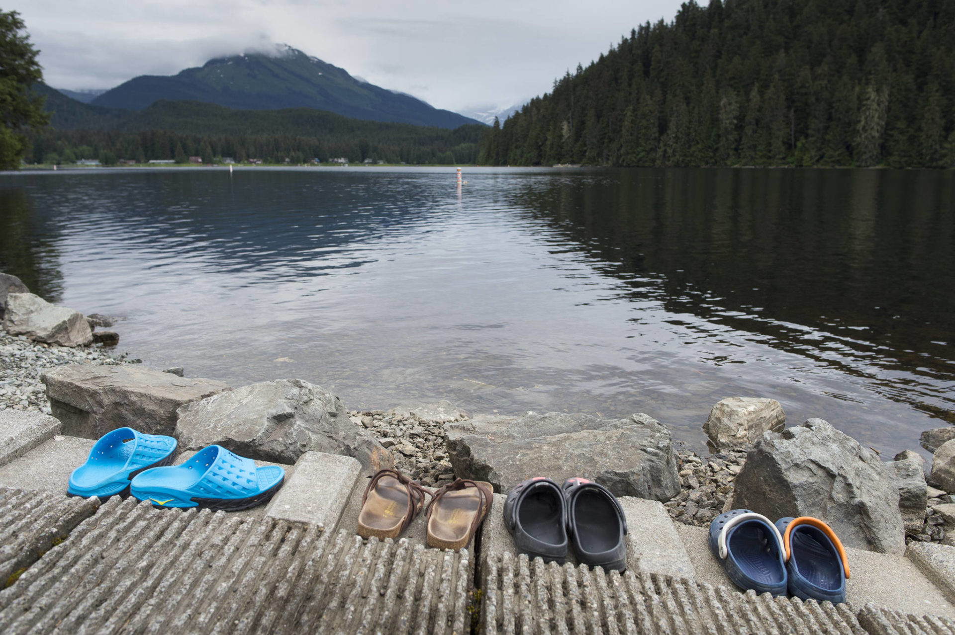 Photos: Triathlon swimmers train at Auke Lake | Juneau Empire