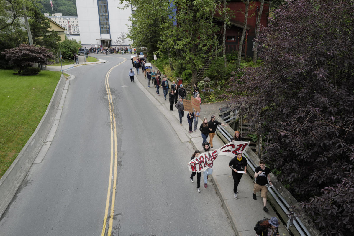 PHOTOS: Protesters in downtown Juneau march to Governor’s Mansion ...