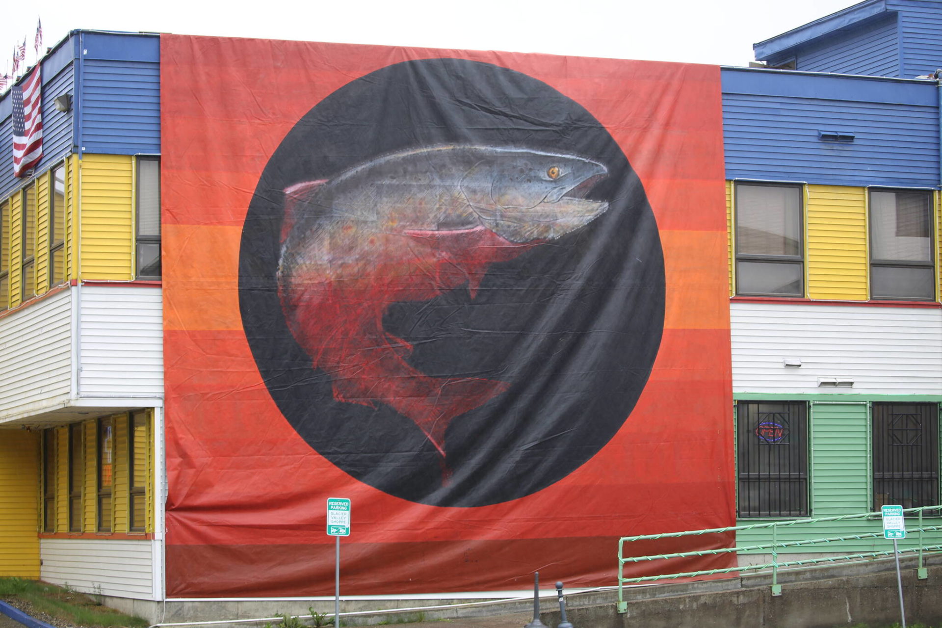 Colombian artist paints salmon mural as symbol for Alaska | Juneau Empire