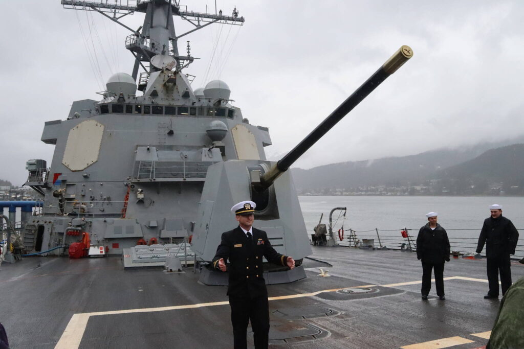 Navy brings out big guns for visitors aboard destroyer as crew works on ...