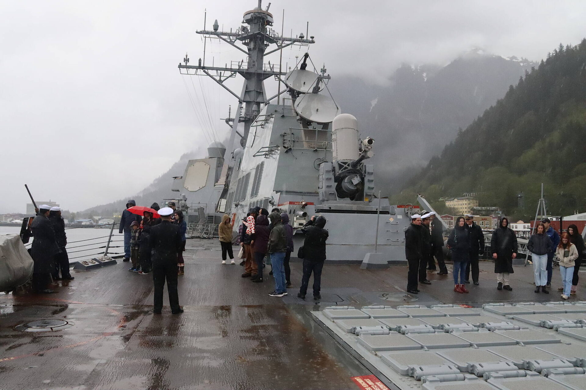 Navy brings out big guns for visitors aboard destroyer as crew works on ...