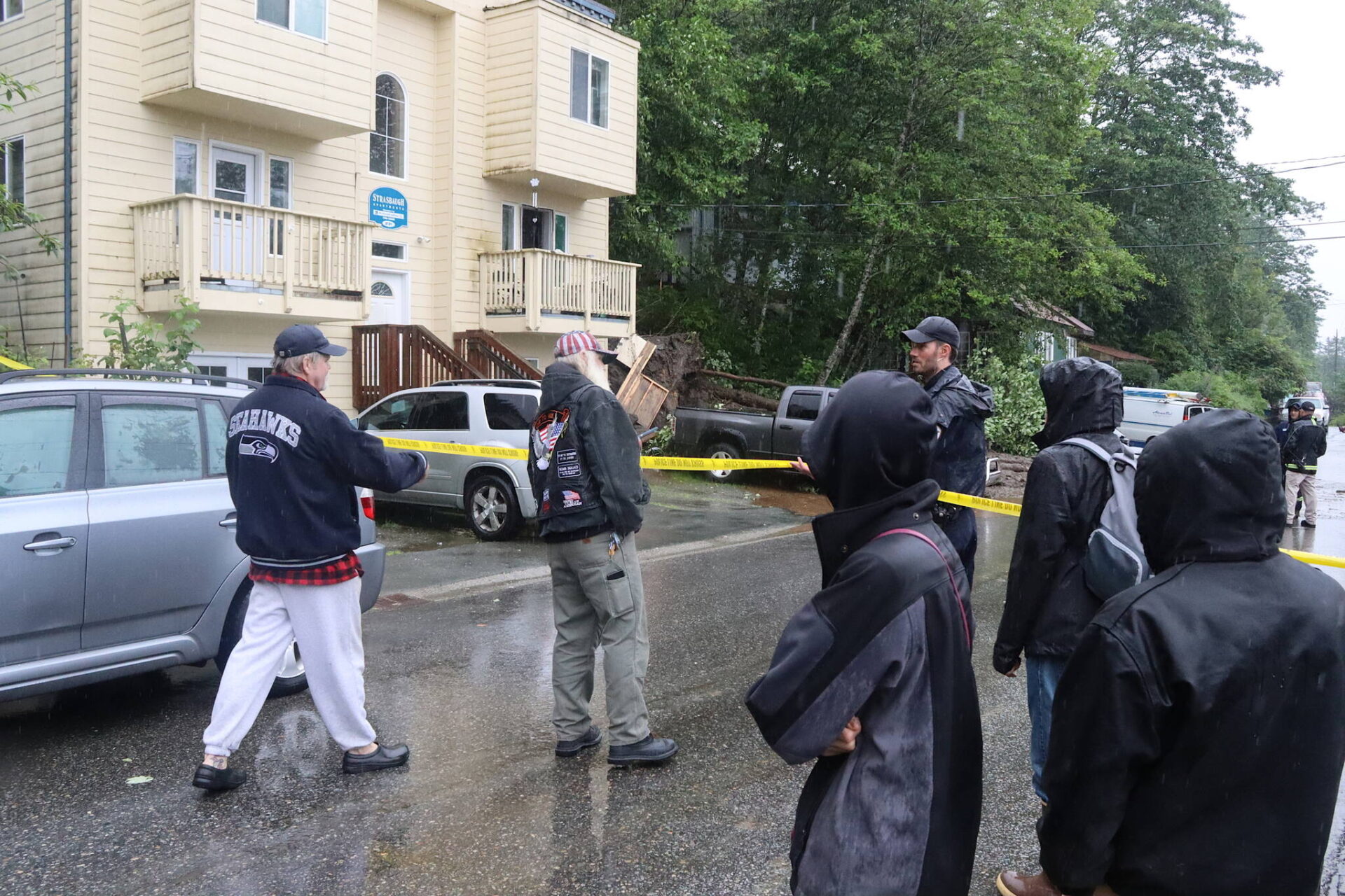 Landslide triggered by heavy rain damages apartment building on ...